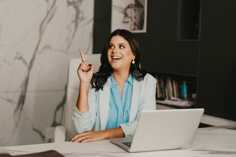 Female Professional at Her Home Office, Smiling with Contentment Stock ...