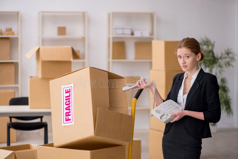 Young Female Professional Mover Doing Home Relocation Stock Image ...