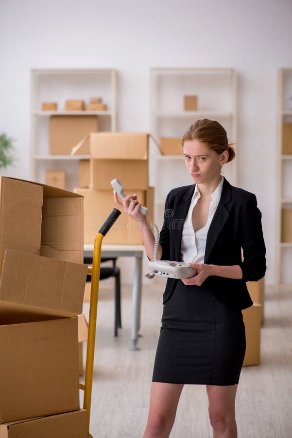 Young Female Professional Mover Doing Home Relocation Stock Image ...