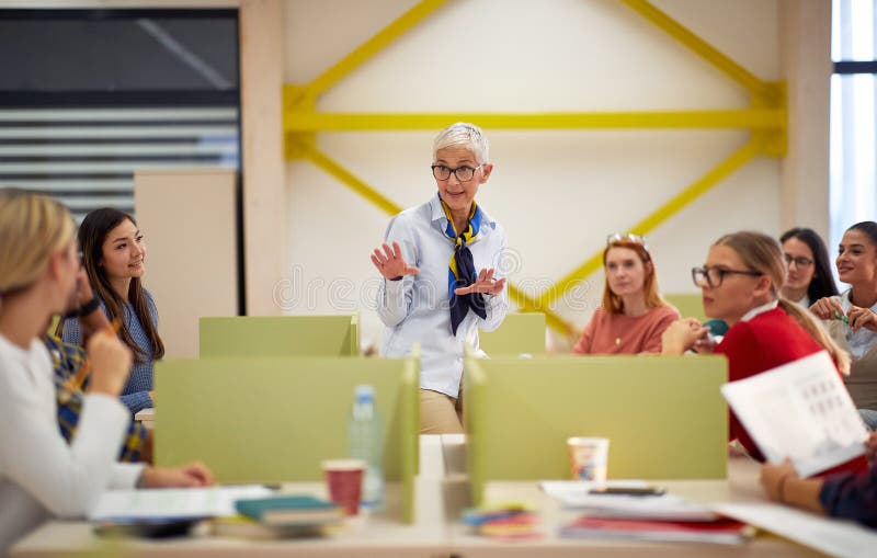 Female Professor Focused on the Lecture Stock Image - Image of books ...