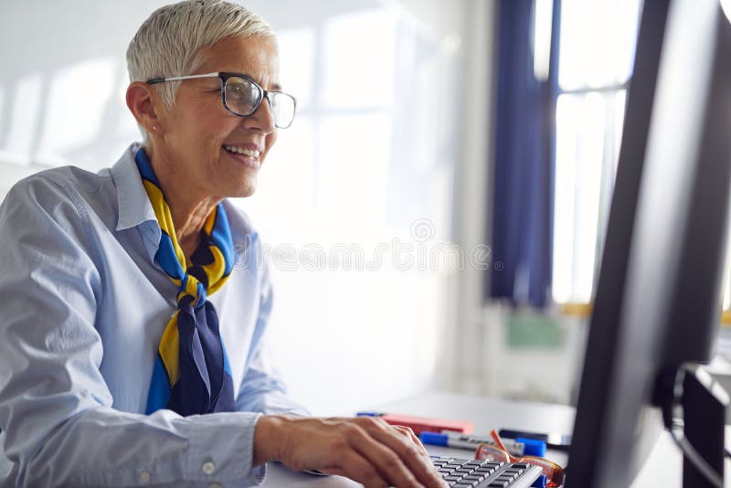 Female Professor in the Lecture Break Working on the Computer Stock ...