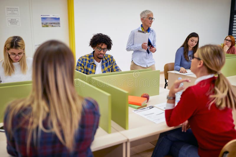 Female Professor and Students at the Lecture Stock Image - Image of ...