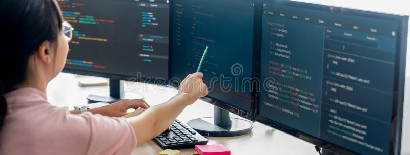 Professional Programer Looking Computer Desktop with Coding Program. AIG42. Stock Image - Image ...