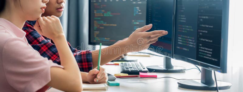 Female Programer Explain While Pointing Code Displayed On Computer
