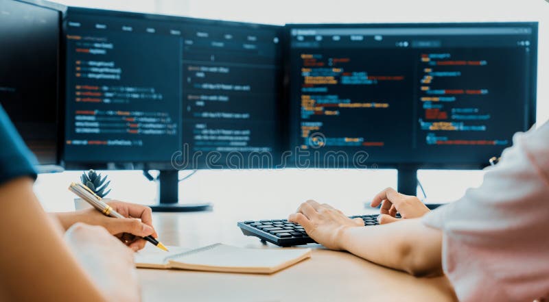 Female Programer Taking a Note while Web Developer Present Program ...