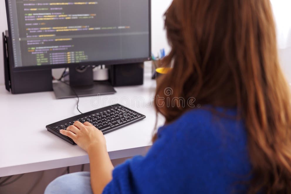 Female Programmer Coding while Working Remotely from Home Stock Photo ...