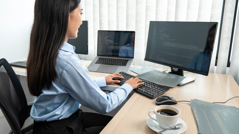 Female Programmer Using Multiple Monitor Screen To Development Business ...