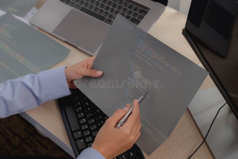 Female Programmer Working on a Computer Planning a Program in an Office ...