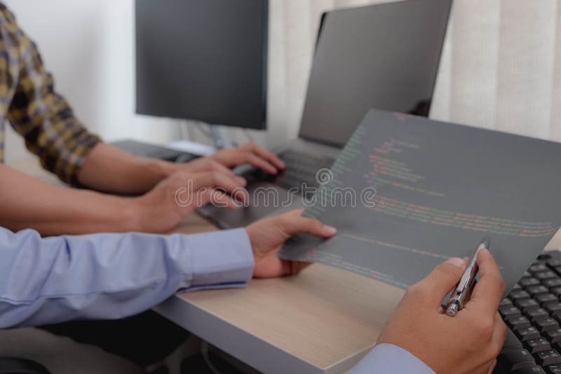 Female Programmer Working on a Computer Planning a Program in an Office ...
