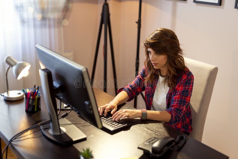 Female Programmer Working in a Home Office Stock Photo - Image of ...