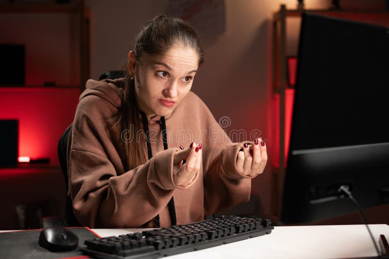Female Programmer Working Overtime at Night at Home Doing Money Gesture ...