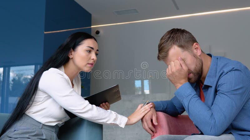 Female Psychologist Making Note While Patient Talking Stock Video