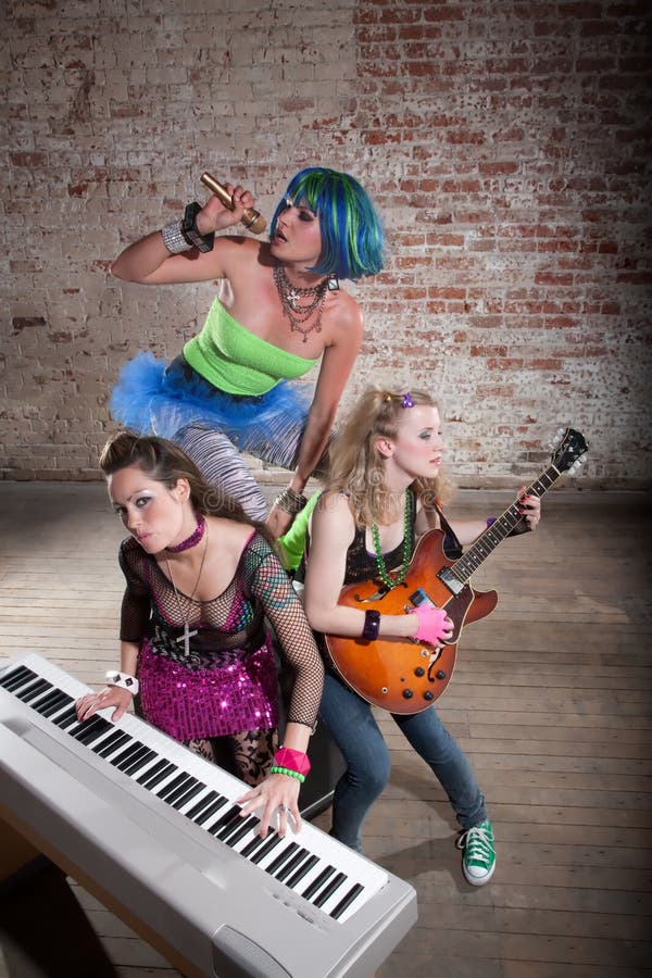 Female Punk Rock Band stock photo. Image of microphone - 14582260