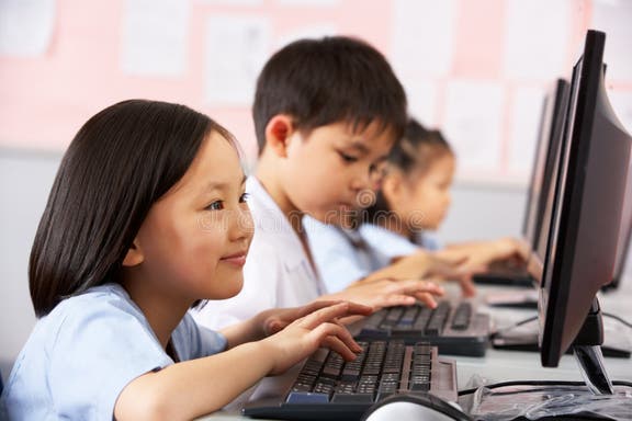 Female Pupil Using Keyboard during Computer Class Stock Image - Image ...