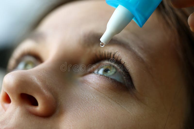 Female Putting Liquid Drops in Her Eye Solving Vision Problem Stock ...