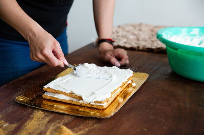 Female Putting Some Cream on a Homemade Cake Stock Image - Image of ...