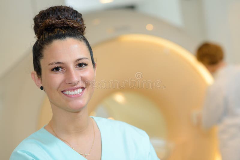 Female Radiologist with Colleagues Standing by Mri Machine Stock Image ...