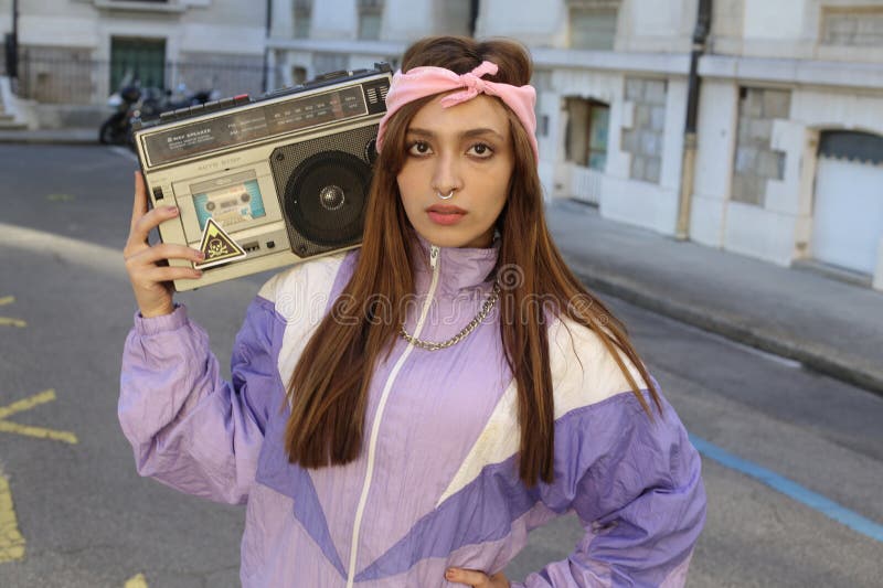 Female Rapper Wearing Pink Bandana, Septum Piercing and Gold Necklace ...