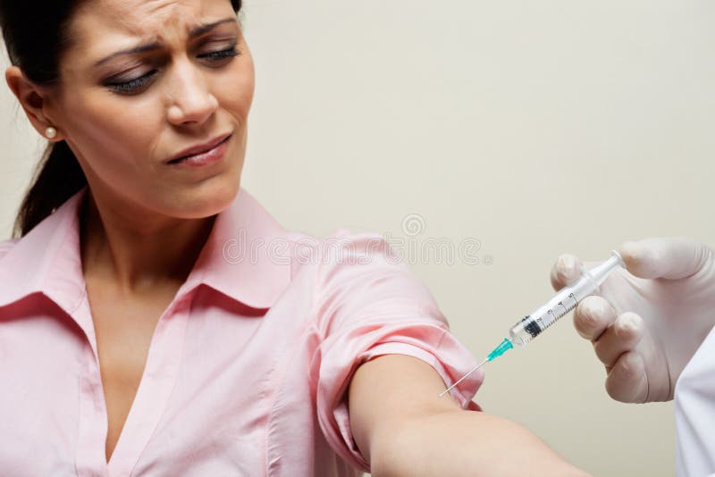 Female Receiving Injection stock photo. Image of health - 36321544