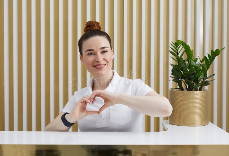Female Receptionist at Reception Desk in a Modern Office Lobby Stock ...