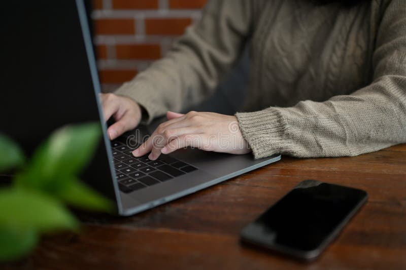 Female Remote Working at the Coffee Shop, Using Laptop, Typing on ...