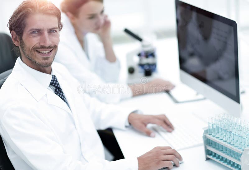 Young Male Technician Working on Computer in Laboratory Stock Photo ...