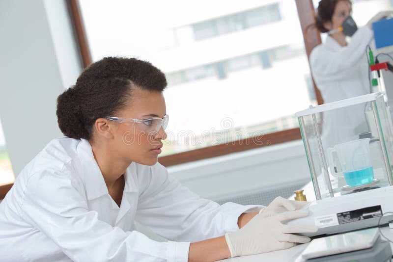 Female Researcher Doing Research in Lab Stock Photo - Image of indoors ...
