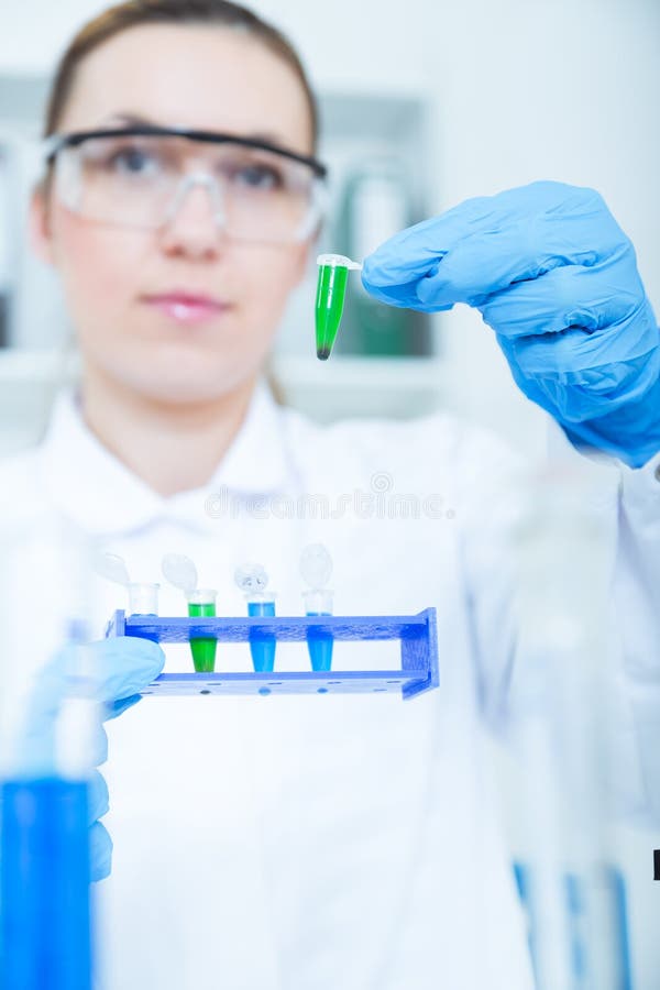 Female Researcher with Glass Equipment in the Lab. Stock Image - Image ...
