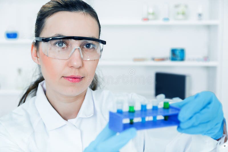 Female Researcher with Glass Equipment in the Lab. Stock Image - Image ...
