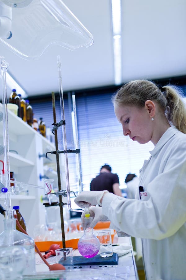 Female researcher in a lab stock photo. Image of biochemistry - 16957724