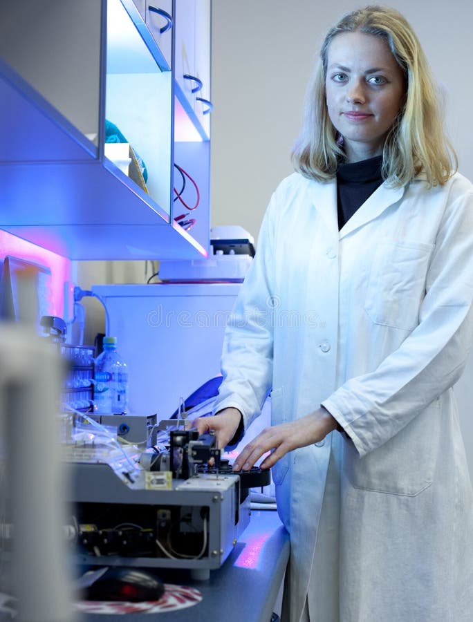 Female Researcher in a Laboratory Stock Photo - Image of experiment ...