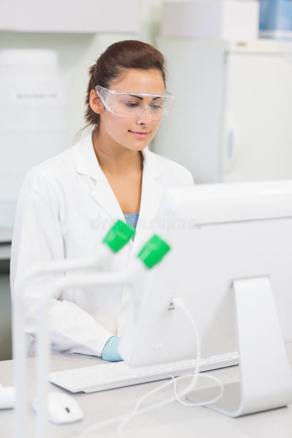Female Researcher Using a Computer in the Lab Stock Photo - Image of ...