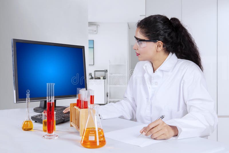 Female Researcher Using a Computer in Laboratory Stock Image - Image of ...