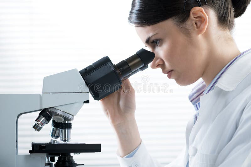 Female Researcher Using Microscope Stock Image - Image of occupation ...