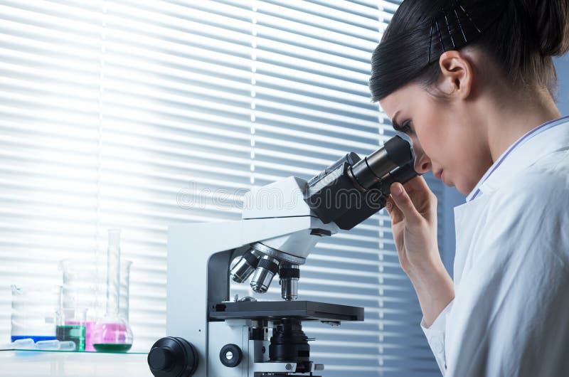 Scientist Using a Microscope Stock Photo - Image of medical, race: 21366612