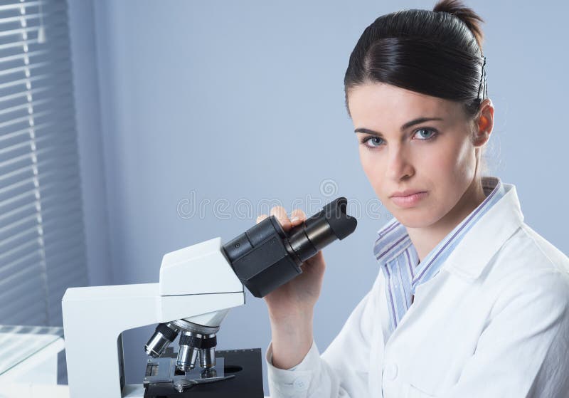 Female Researcher Working With Microscope Stock Image - Image of ...