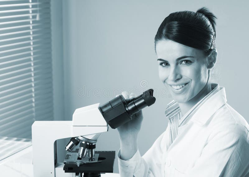 Female Researcher Working with Microscope Stock Photo - Image of ...