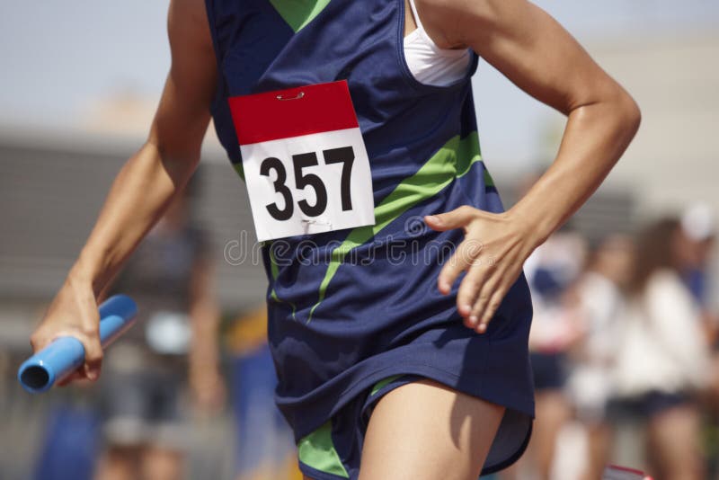 Relay Baton on Running Track Stock Image - Image of multi, racing: 74026113
