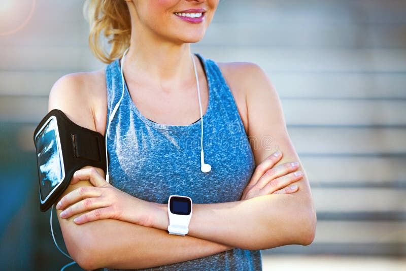 Female Runner with Mobile Phone and Smart Watch Stock Image - Image of ...