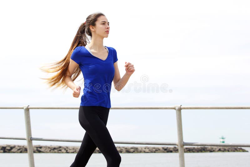Female Runner Outside by the Sea Stock Image - Image of copy, ocean ...
