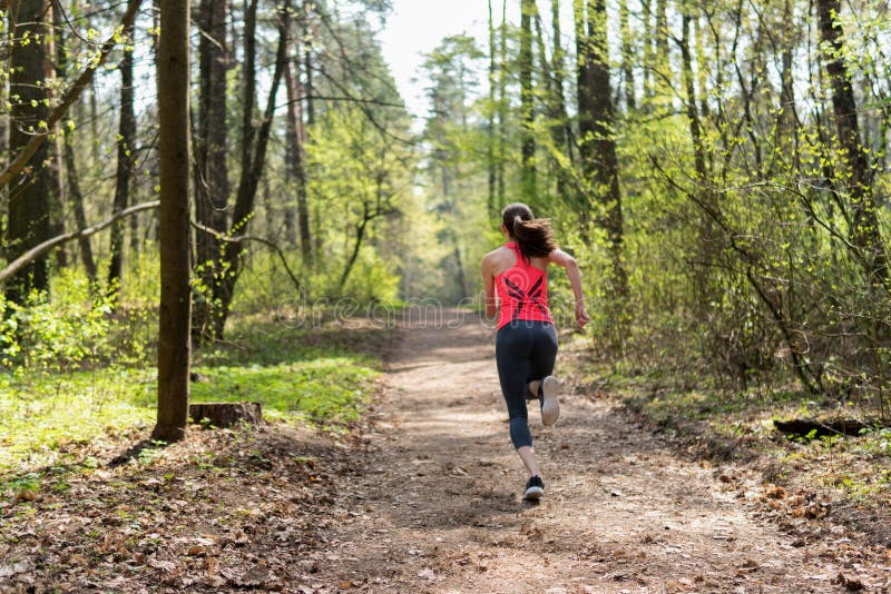 Female Runner Run in Spring Sunny Forest Stock Photo - Image of jogging ...