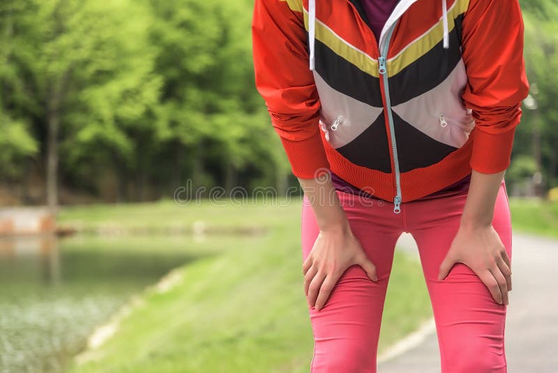 Female Runner Taking a Rest Stock Photo - Image of stone, athletic ...