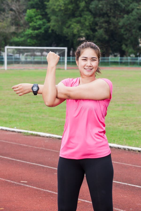 Female runner to warm up stock photo. Image of arms, female - 53975158