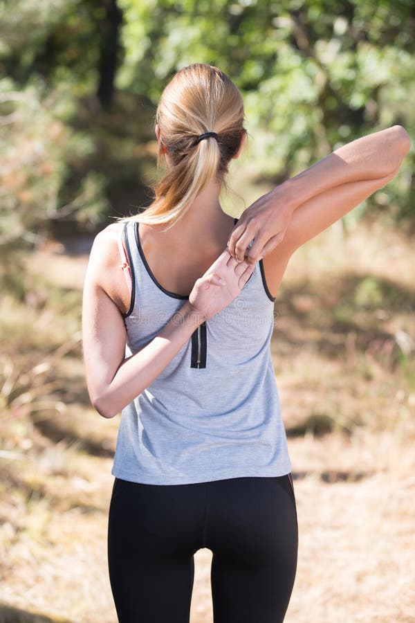 Female Runner Warming Up and Exercising Stock Photo - Image of healthy ...