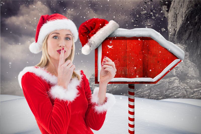Female Santa with Finger on Lips Standing in Snowfall Stock Image ...