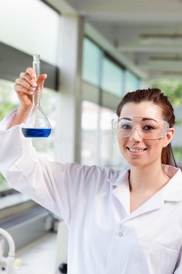 Female Science Student Pouring Liquid Stock Image - Image of laboratory ...