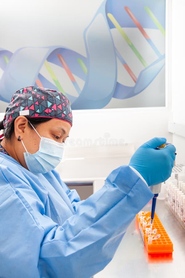 Female Scientist Extracting Dna Using The Spin Column Based Nucleic