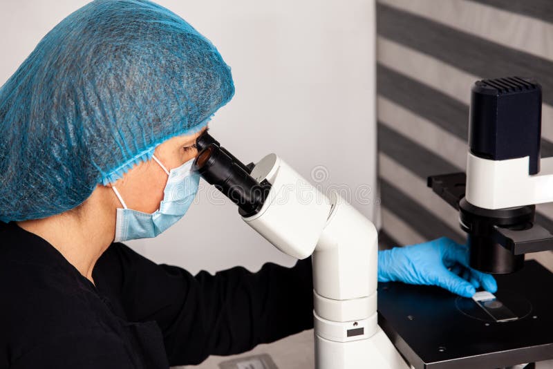 Portrait of a Female Scientist Next To the Laminar Air Flow Cabinet in ...