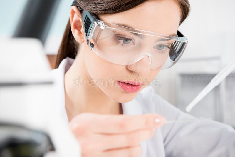Female Scientist in Protective Glasses Stock Photo - Image of scientist ...