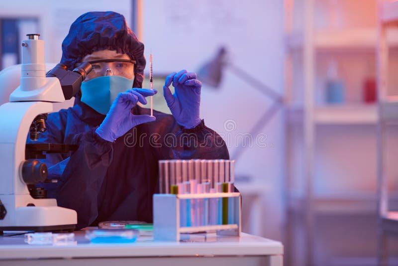 Scientist with Syringe Working at the Lab Stock Image - Image of doctor ...